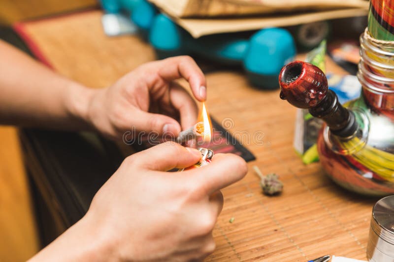 Lighting a Joint stock photo. Image of drug, drugs, ganja - 92405824