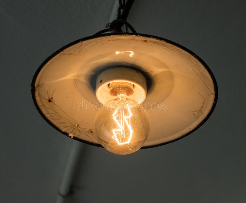 Lighting Light Bulb on the Cable in Dark Room Stock Photo - Image of ...