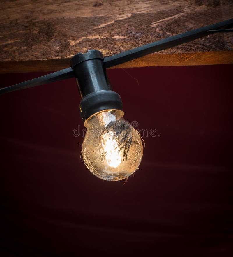 Lighting Light Bulb on the Cable at Dusk Stock Image - Image of matt ...