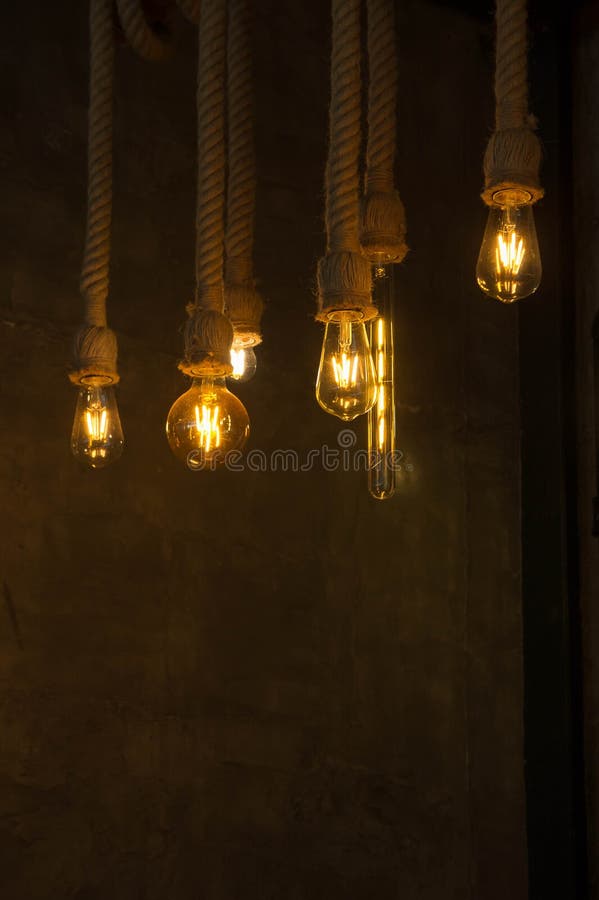 Lighting from a Light Bulb in a Cafe Stock Image - Image of dark ...