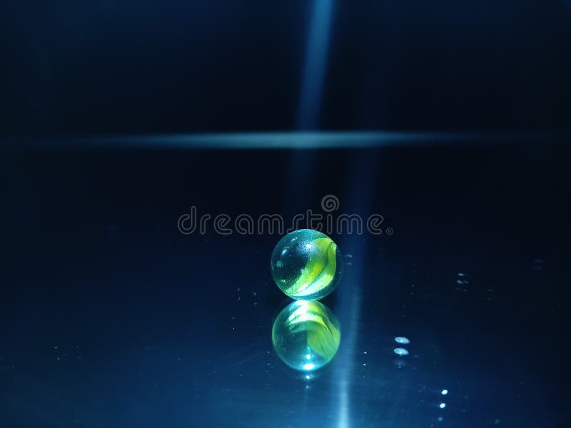 The lighting marbles stock photo. Image of marbles, mirrorefect - 203059298