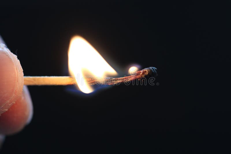 Lighting a Match from the Matchbox Stock Photo - Image of light, colors ...