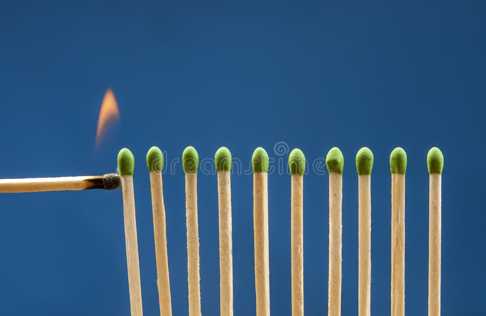 Lighting the matches. stock photo. Image of fire, matches - 65631740