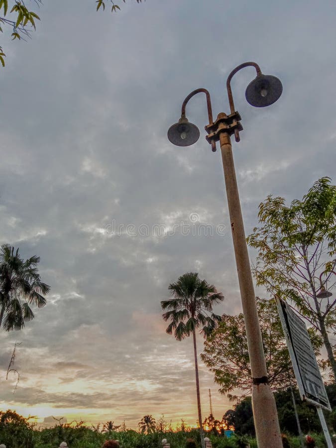 Lighting Poles on the Side of the Road in the Evening?? Stock Image ...