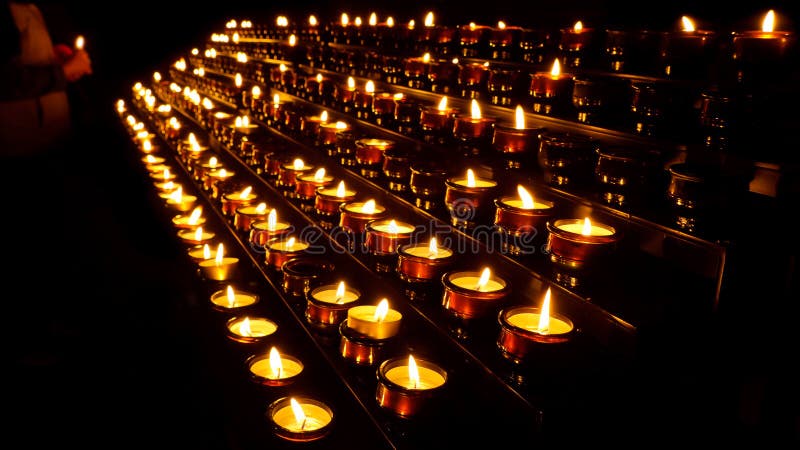 Lighting Prayer Candles In A Church Royalty Free Stock Photos - Image ...