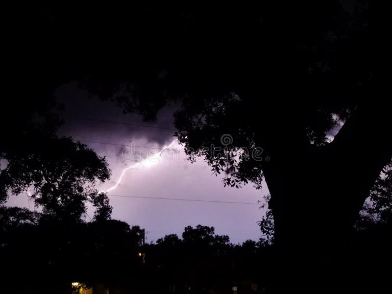 Lighting strike at night stock image. Image of outside - 123573657