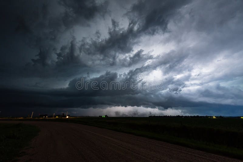 Lightning Bolts Flash through a Dark Storm Cloud Stock Image - Image of ...