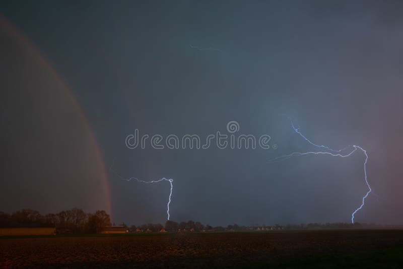 Lightning Storm with Rainbow Stock Image - Image of dusk, extreme ...