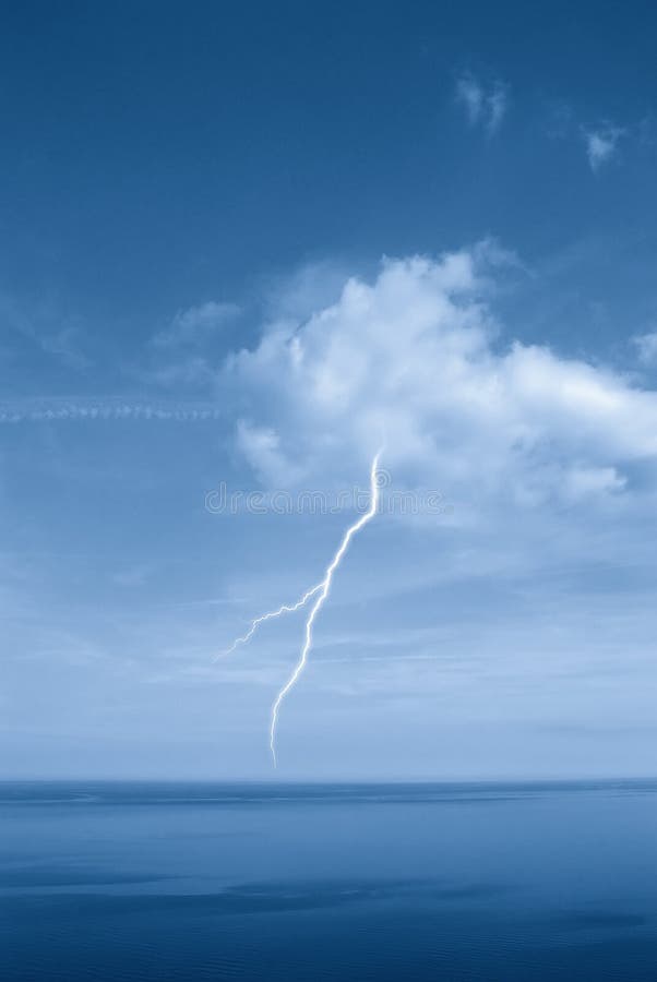 Lightning in a clear sky stock photo. Image of outdoors - 22466562