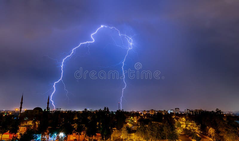 Lightning Discharges in the Night Sky during a Thunderstorm. Stock ...