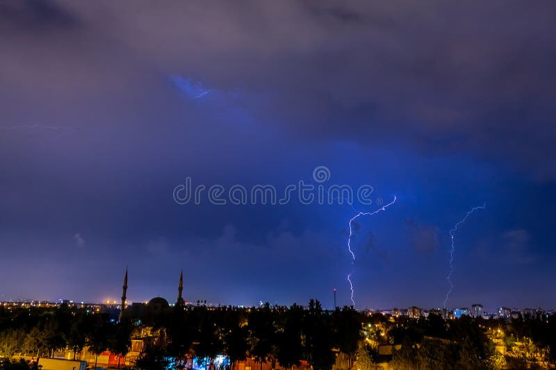 Lightning Discharges in the Night Sky during a Thunderstorm. Stock ...