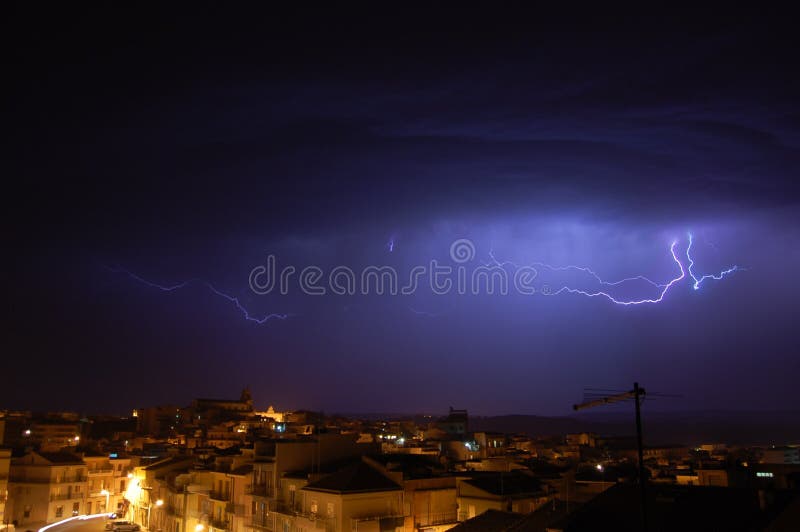 Lightning storm over city stock image. Image of building - 29679677