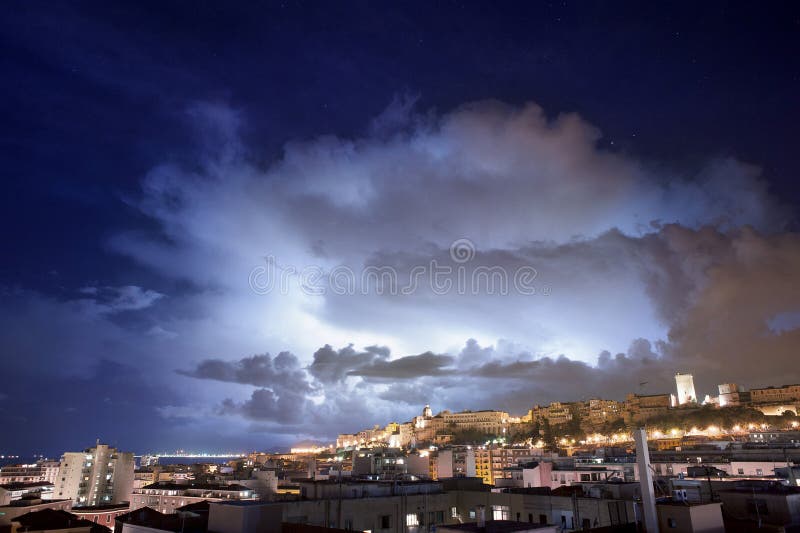 Cagliari Panorama at Night with Lightning Strikes Behind the City ...
