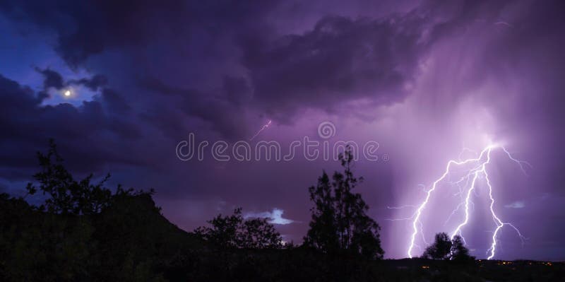 Lightning and the Moon stock photo. Image of landscape - 155157710