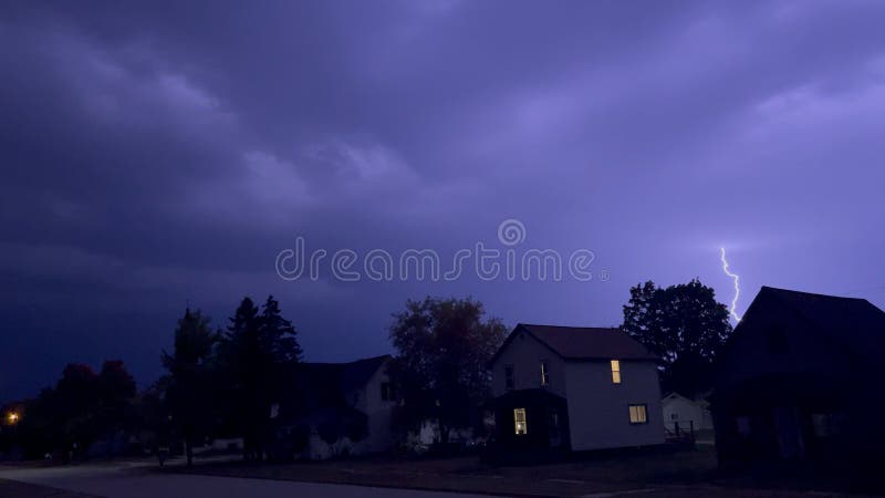 Lightning in the night sky stock image. Image of overhead - 339404917