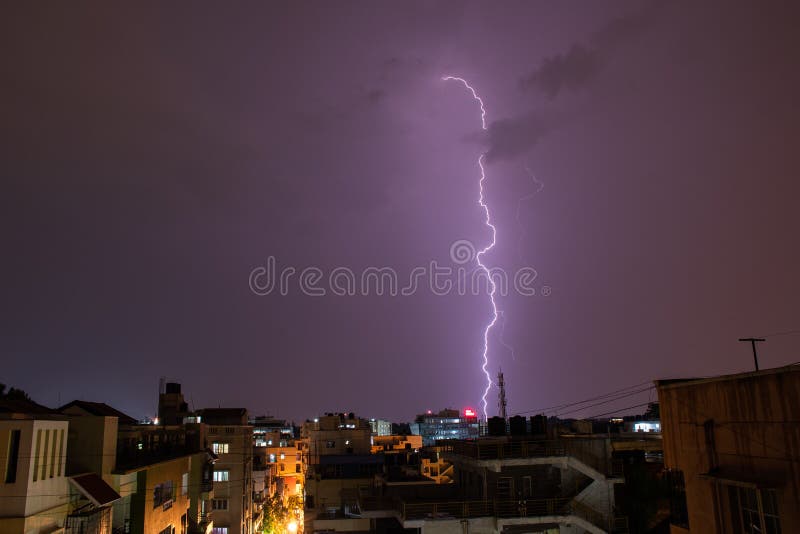 Lightning over buildings stock image. Image of nightscape - 187740701