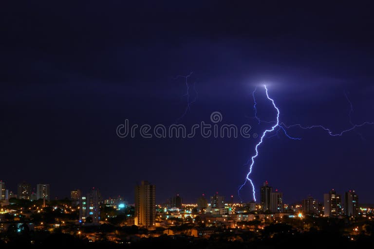 Lightning Over a City stock photo. Image of bolt, light - 3525620