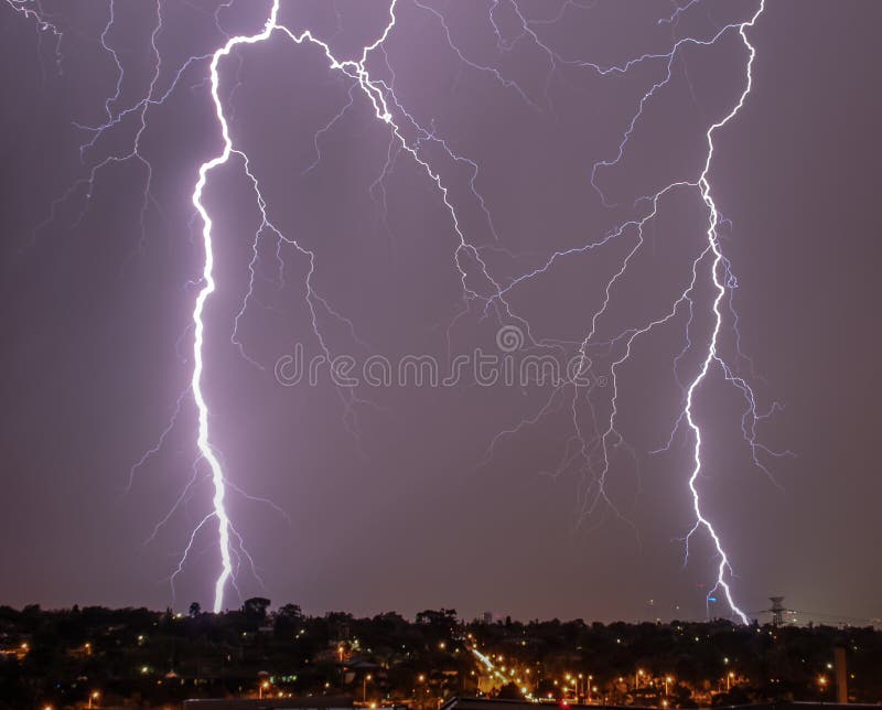 Lightning Over City Skyline Stock Photo - Image of lightning, nature ...