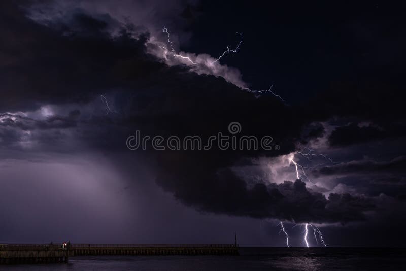 Lightning over the ocean stock photo. Image of wallpaper - 268978336
