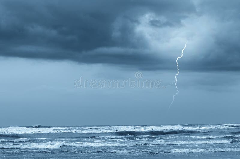 Lightning over the ocean stock photo. Image of environment - 50532484