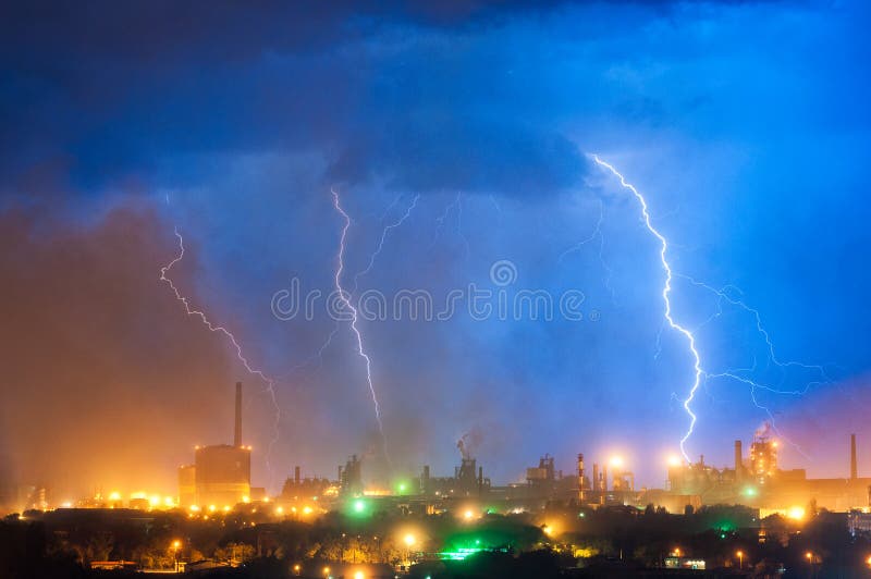 Lightning over the plant stock photo. Image of night - 63611396