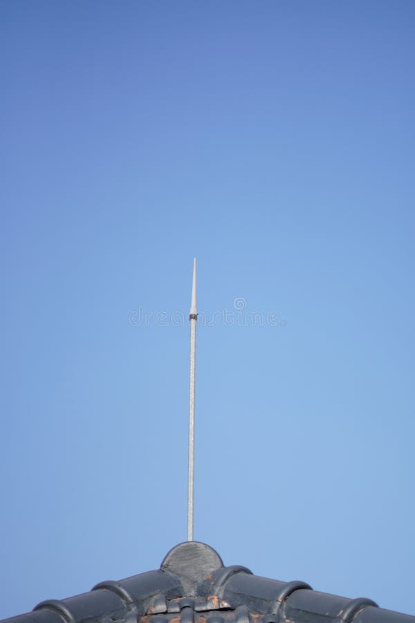 A Lightning Protection Device Installed on the Roof Tiles of a House ...