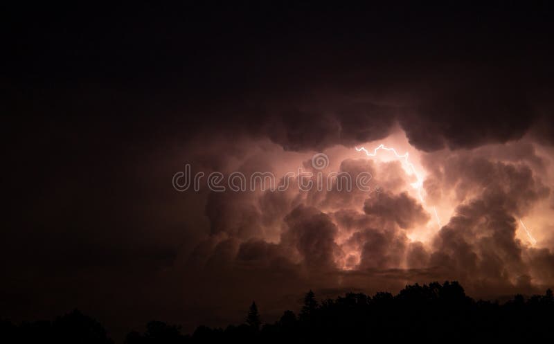 Lightning in the Sky during a Storm at Night Stock Photo - Image of ...