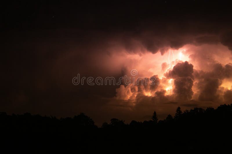Lightning in the Sky during a Storm at Night Stock Photo - Image of ...
