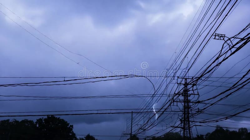 Lightning Storm Illuminating Power Lines and Dark Sky Stock Video ...