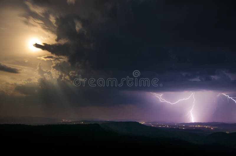 Lightning Storm At Night With Full Moon Stock Photo - Image of flash ...
