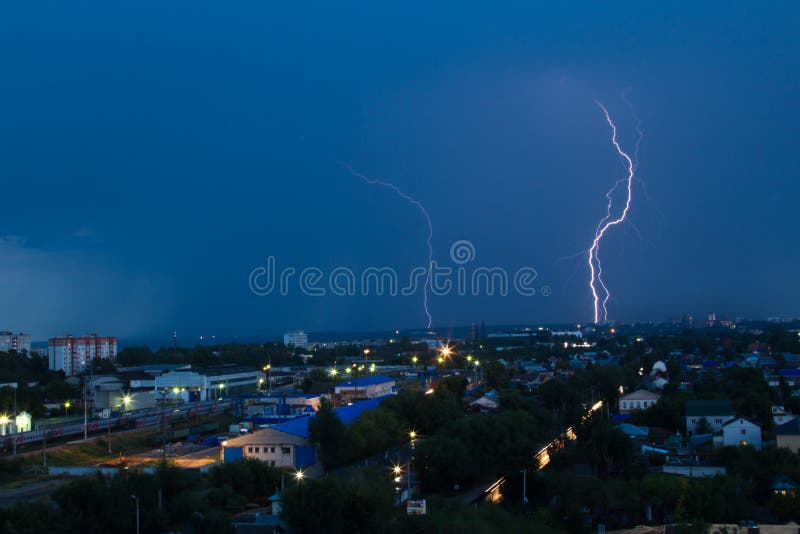 Lightning Storm Over City in Purple Light Stock Image - Image of ...