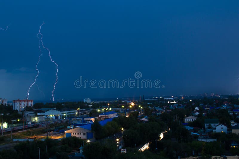 Lightning Storm Over City in Blue Light Stock Photo - Image of blue ...