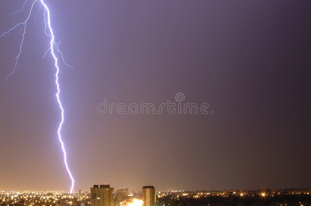 Lightning Streak from a Thunderstorm Cloud at Night in a Rural Setting ...