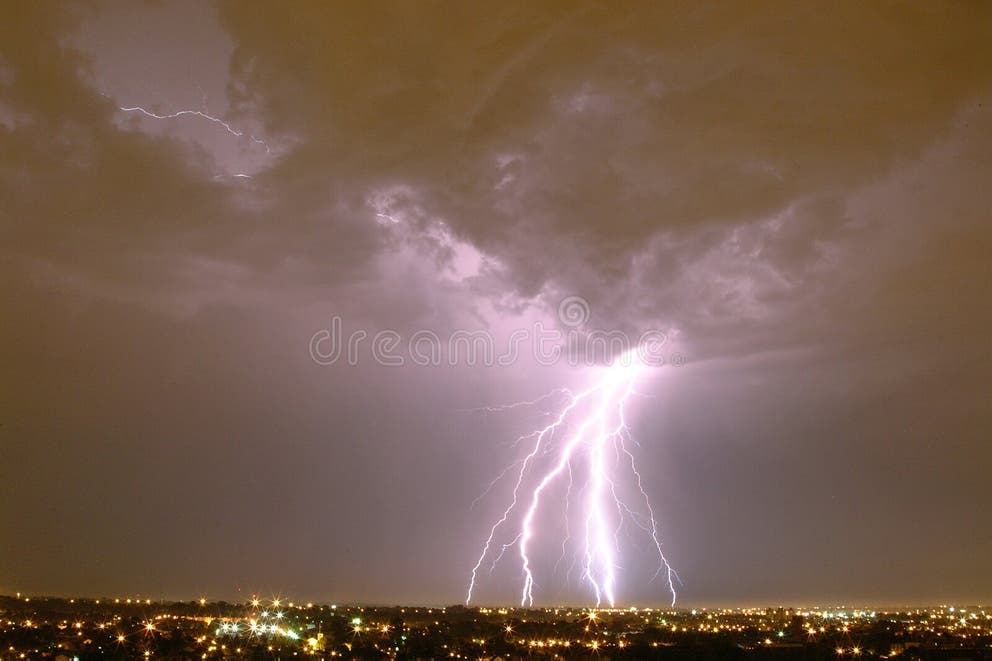 Lightning Streak from a Thunderstorm Cloud at Night in a Rural Setting ...