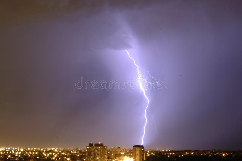Lightning Streak from a Thunderstorm Cloud at Night in a Rural Setting ...