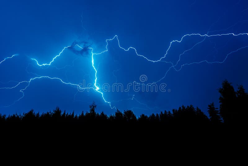 Lightning Strike on a Dark Blue Sky Stock Photo - Image of lightning ...