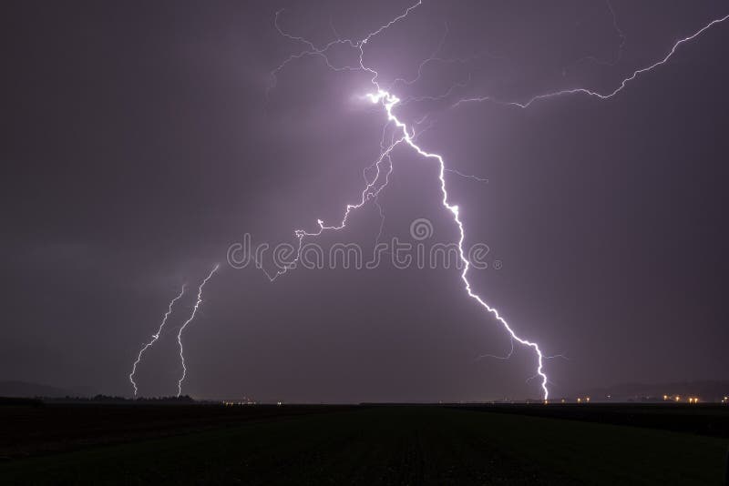 Lightning Strike at night stock image. Image of energy - 231840283