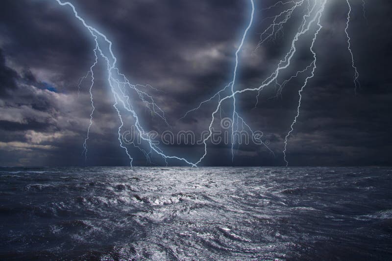 Lightning Strike Over the Ocean. Bolt of Lightning Over Stormy Dark Sea ...
