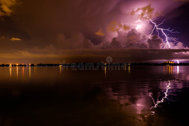 Lightning Strike by the Water in the Sunset Stock Image - Image of ...
