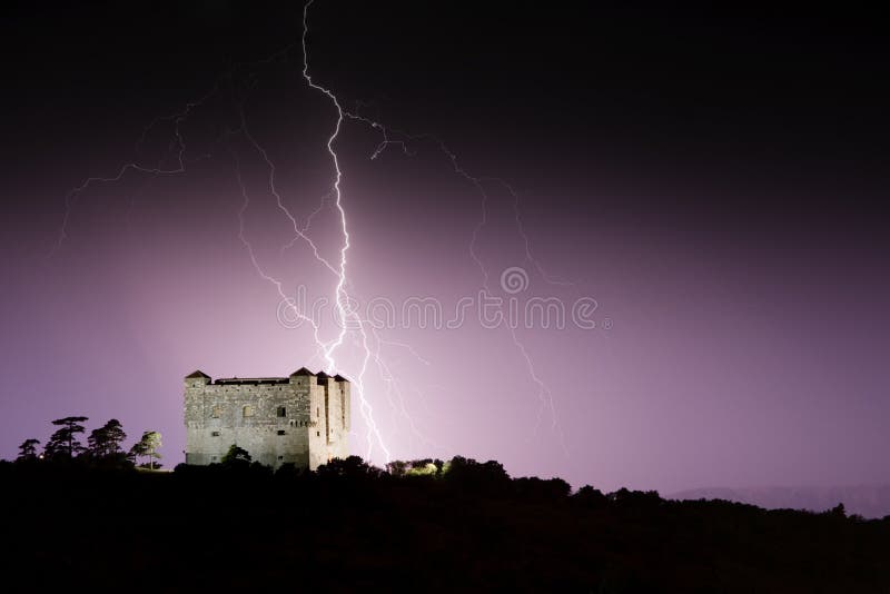 Old castle with lightning stock photo. Image of black - 15020134