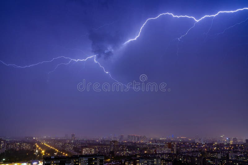 Lightning Strikes in the Night Sky Over the Night Town Stock Image ...