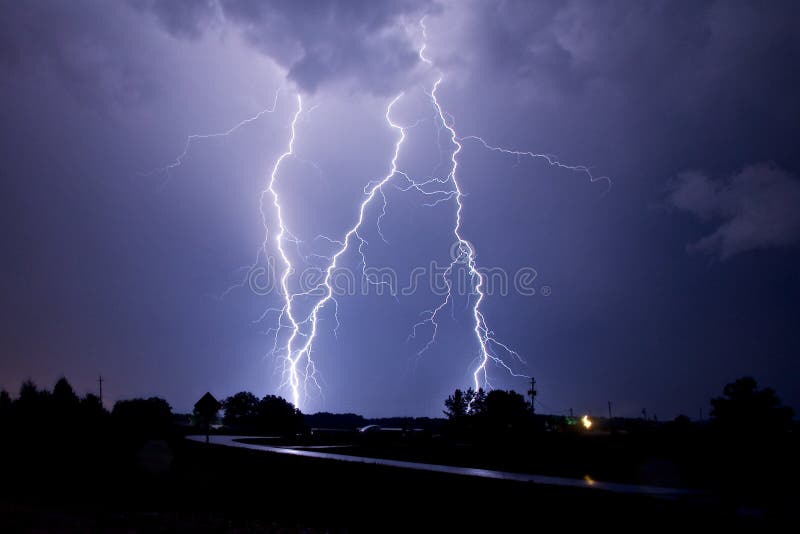 Lightning Strikes Three Times! Stock Photo - Image of thunderstorm ...