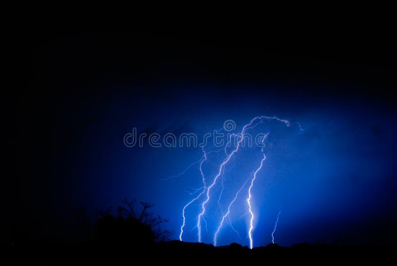 Electric Lights and Lightning Over Residential Rooftops Stock Photo ...