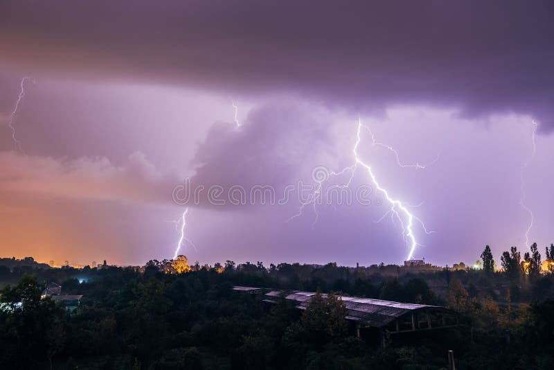 Lightning Strikes during Thunderstorm Over the City Stock Photo - Image ...