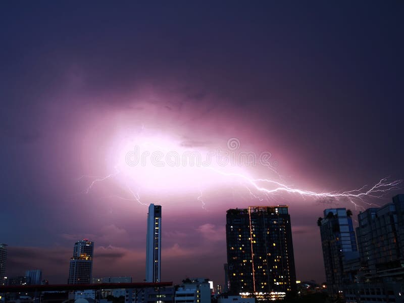 Lightning Thunder Flash Over City in Purple Light Stock Image - Image ...