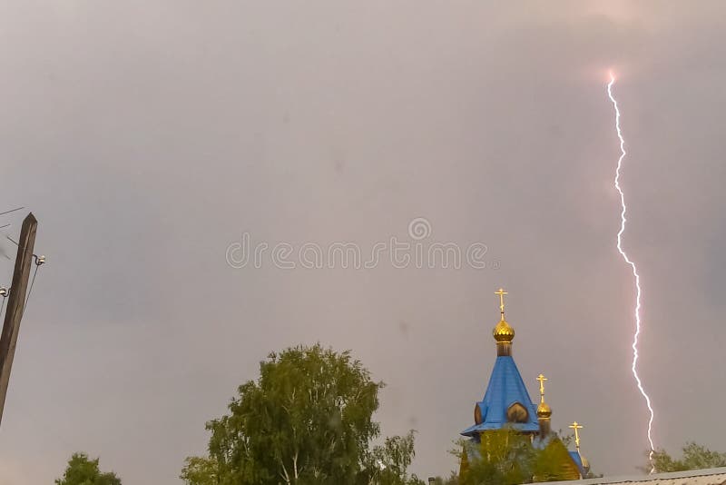 Lightning during a Thunderstorm in the Sky Above the Dome and Cr Stock ...
