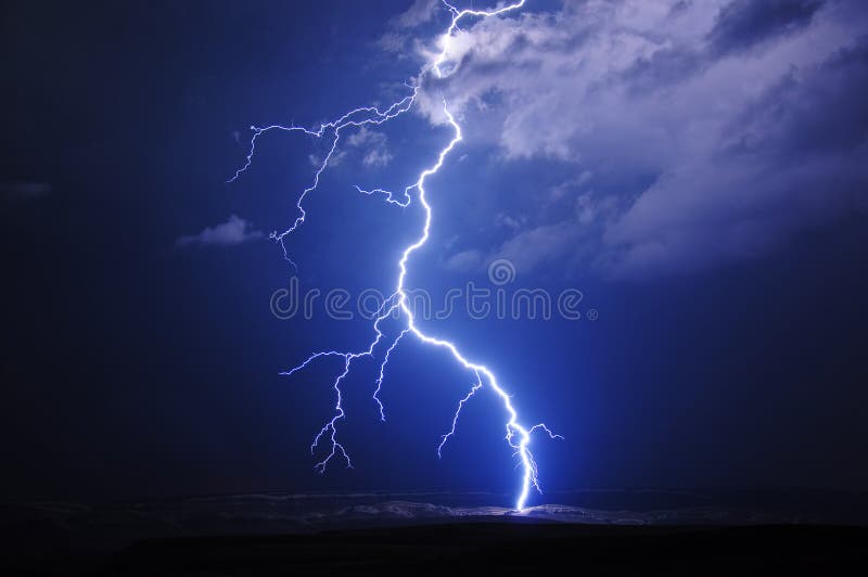 Lightning touching earth stock photo. Image of impact - 152141282