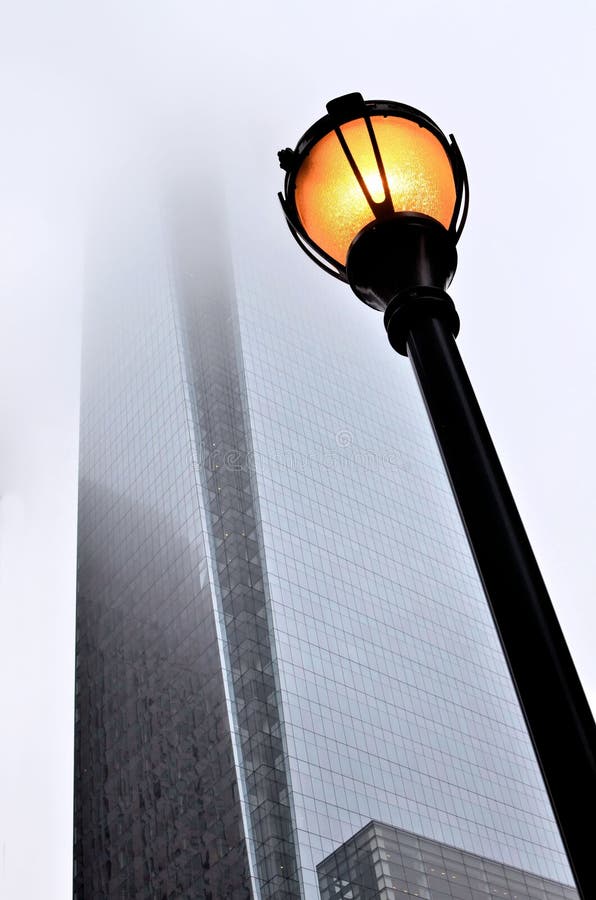 Lightpost and skyscraper stock photo. Image of building - 28439186