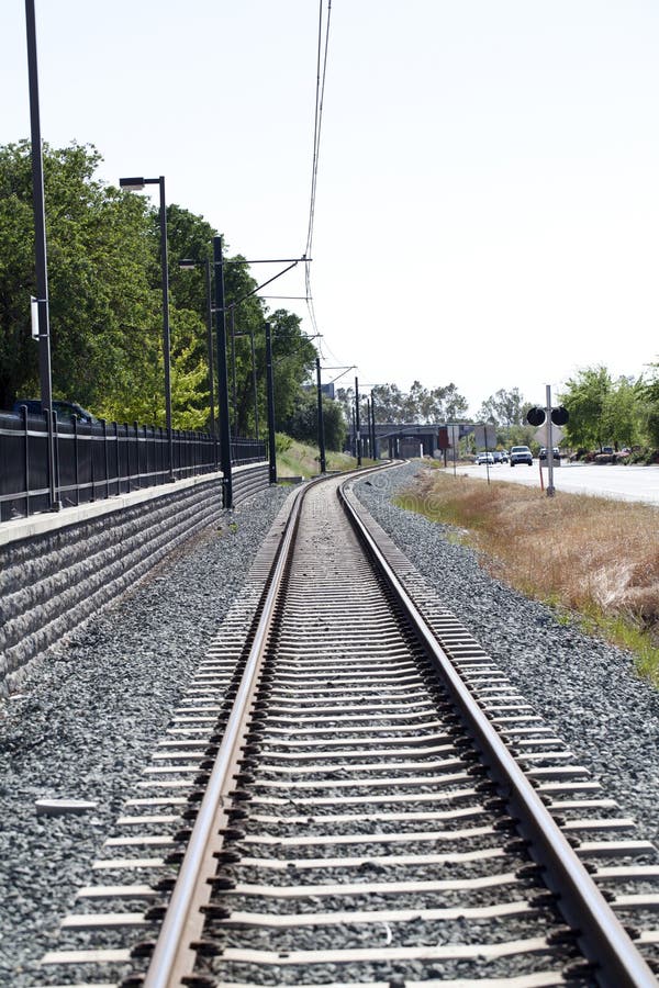 Lightrail Tracks and Road with Traffic Stock Photo - Image of curve ...