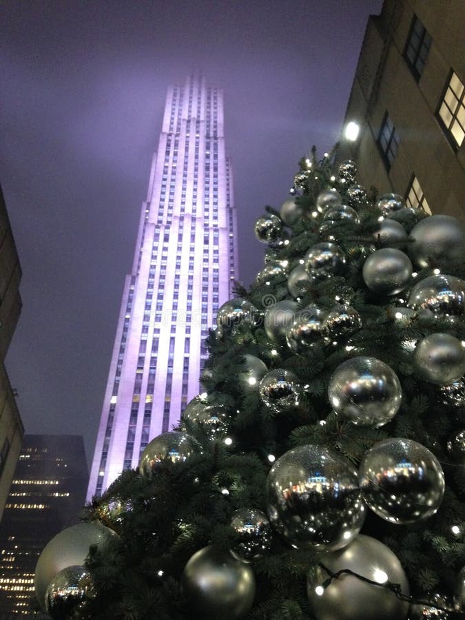 Lights and Ball Ornaments on a Christmas Tree with Rain Drops after ...